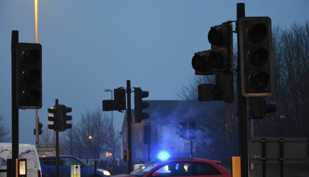 Police vehicles stationed on Thamesdown Drive after crash causes ...