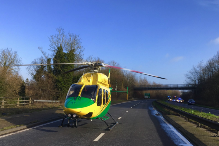 Four injured after car hits central reservation and overturns on A303