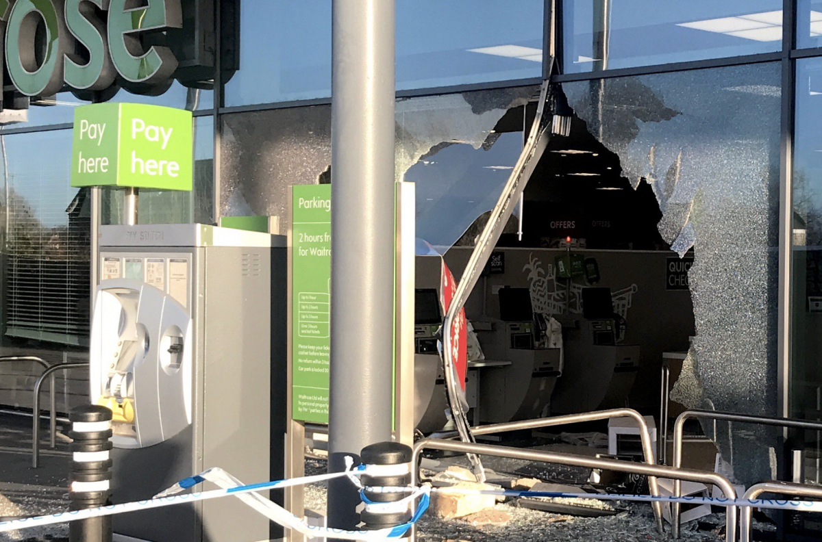Thieves steal cash machine set in glass storefront of Waitrose store in ...