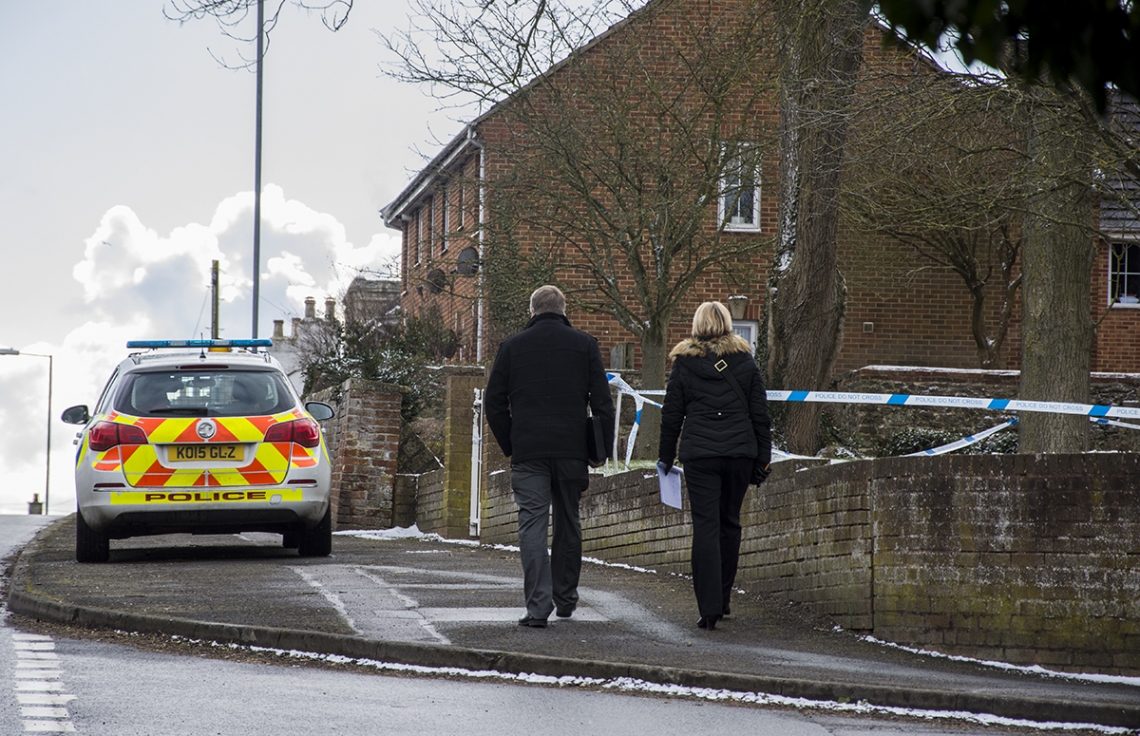 Snow falls at crime scene as police continue to investigate body discovery
