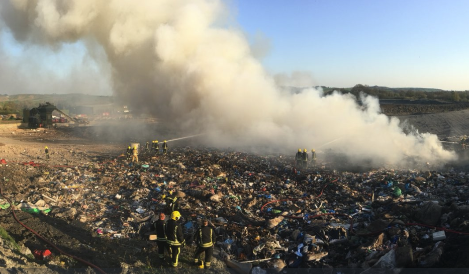 Firefighters working to 'contain fire before darkness' after blaze ...