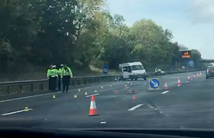 Woman killed and three injured in second M4 minibus crash of the week