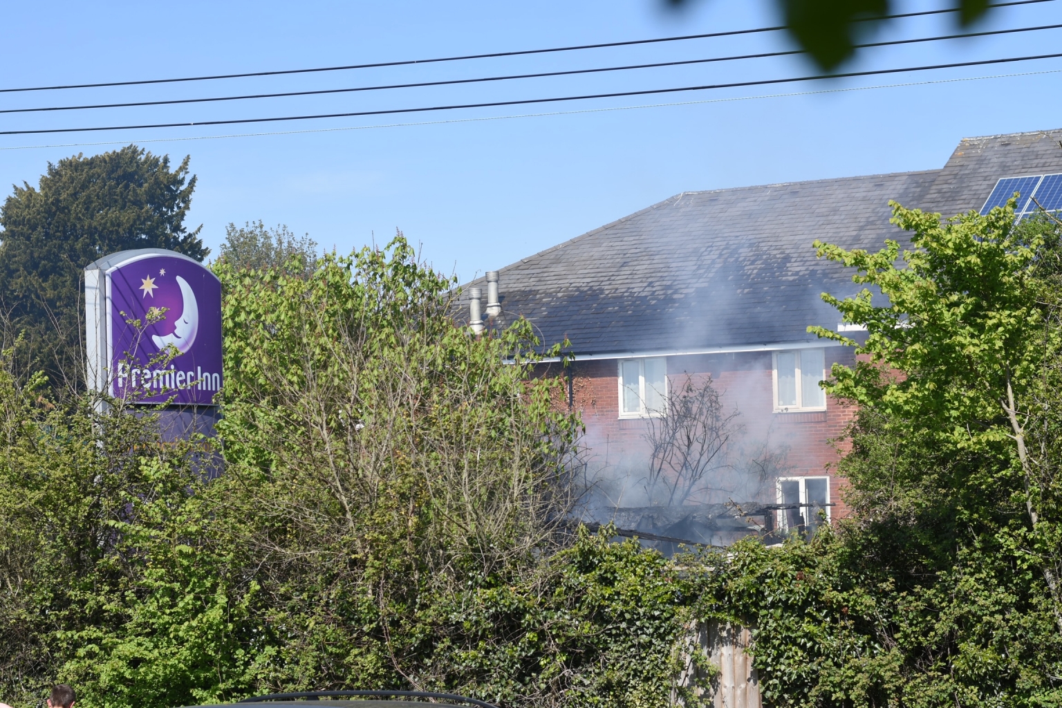 Firefighters battle blaze behind Premier Inn hotel in north Swindon