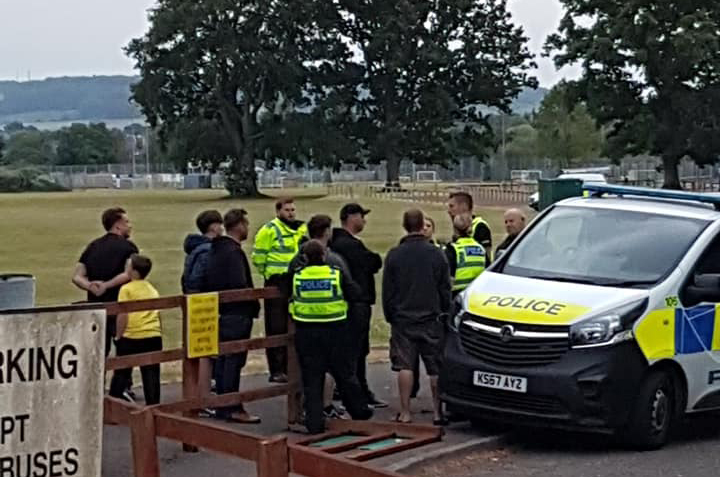 Police called as travellers move onto school field after smashing ...