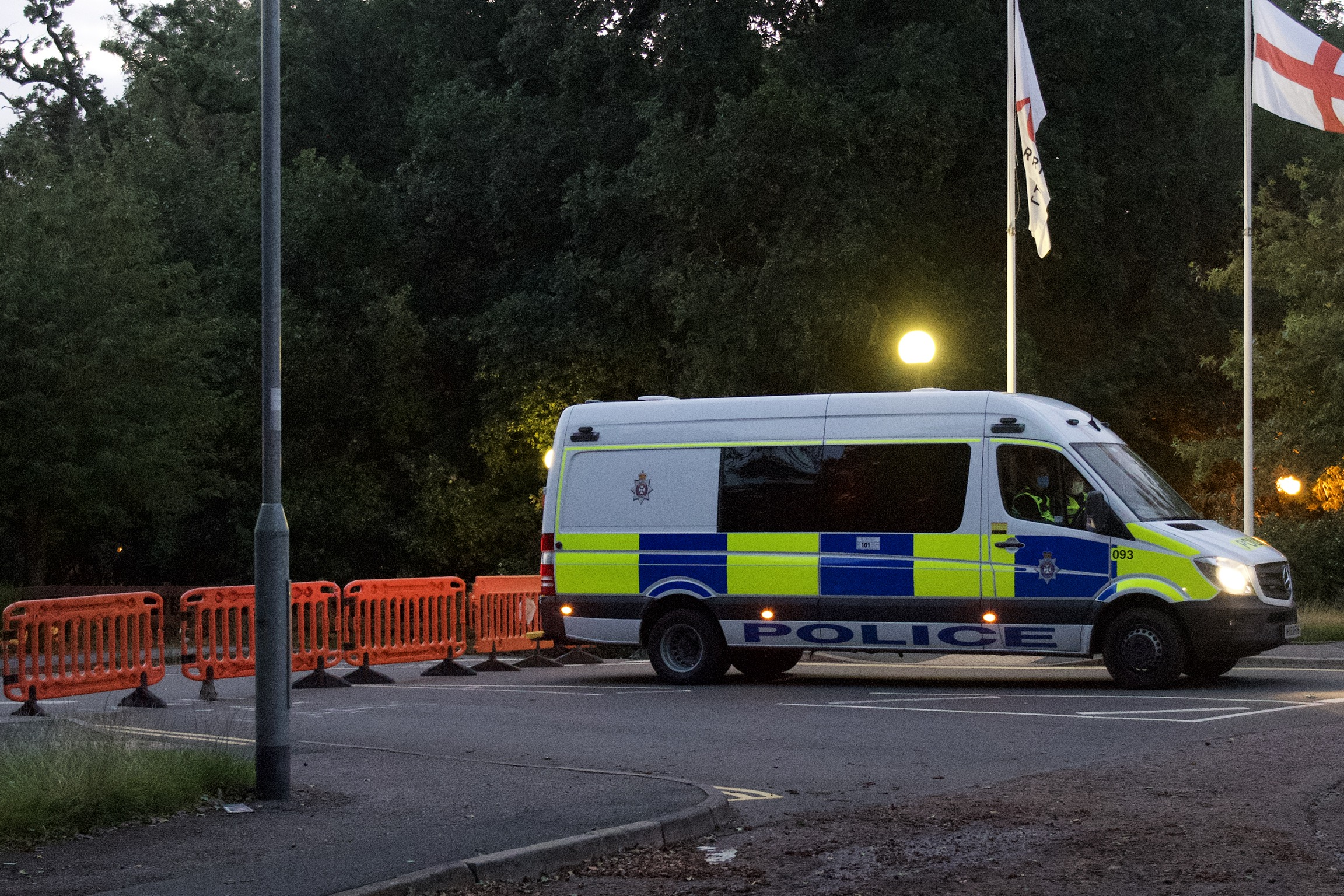 Riot vans patrol Swindon as businesses take security measures ahead of rave