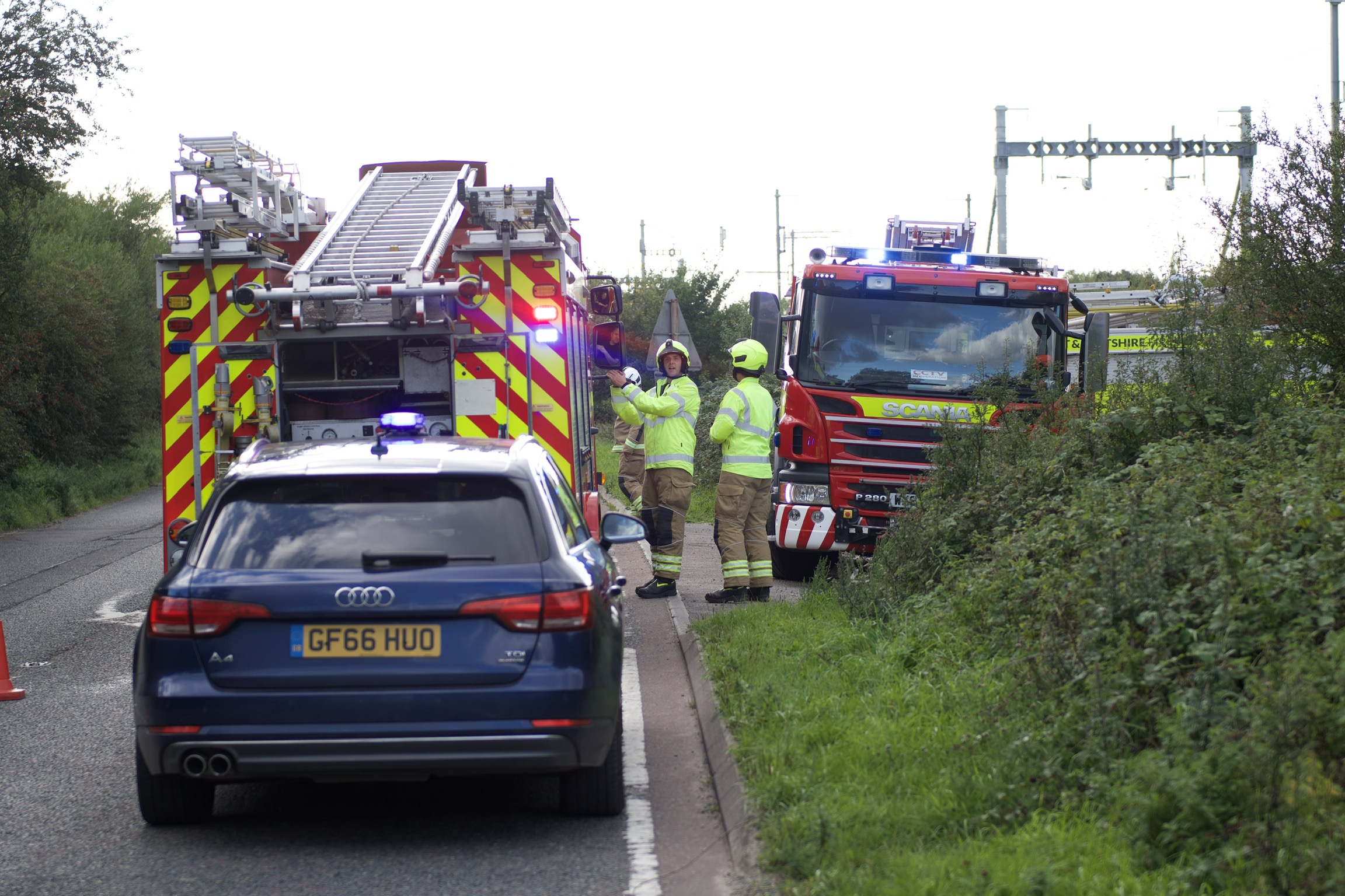 A420 partially blocked as fire crews battle blaze in building near railway
