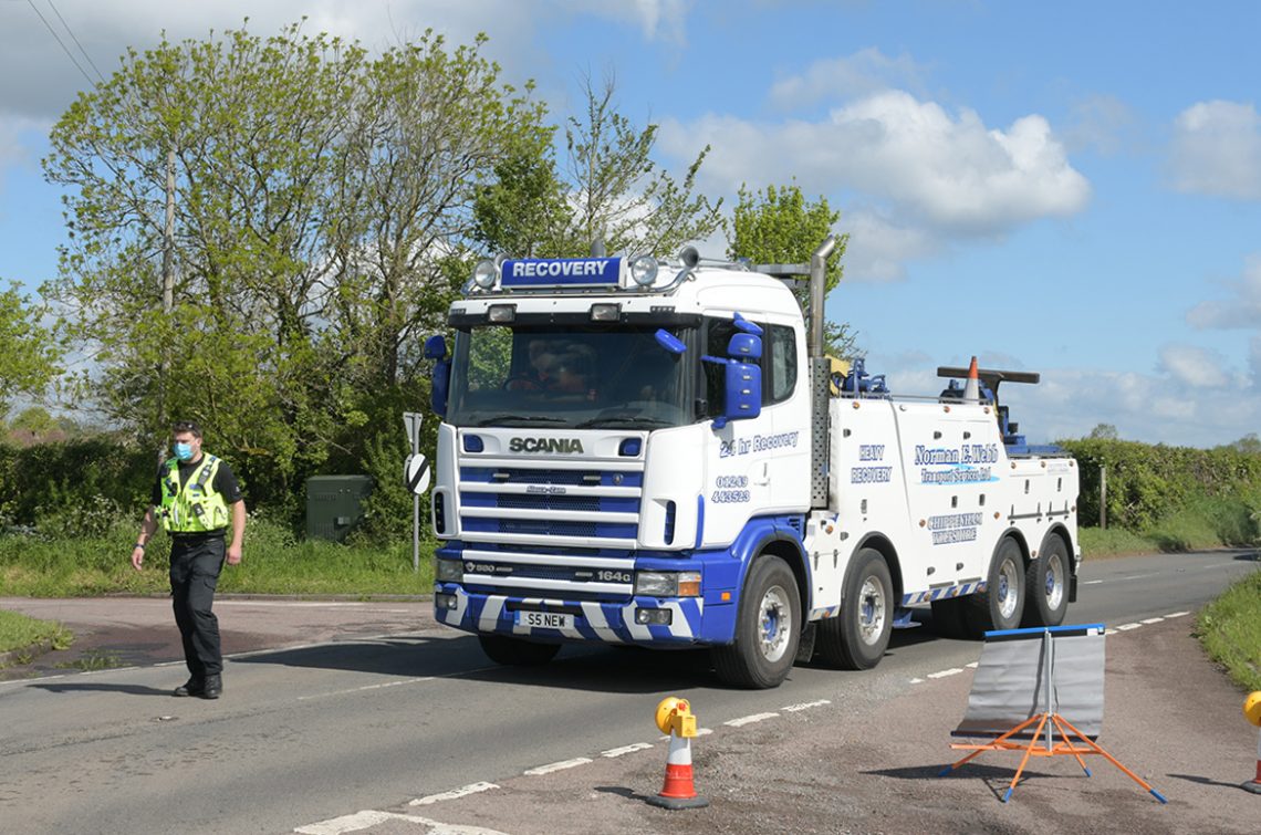 Road closed after M J Church lorry overturns in roadside ditch