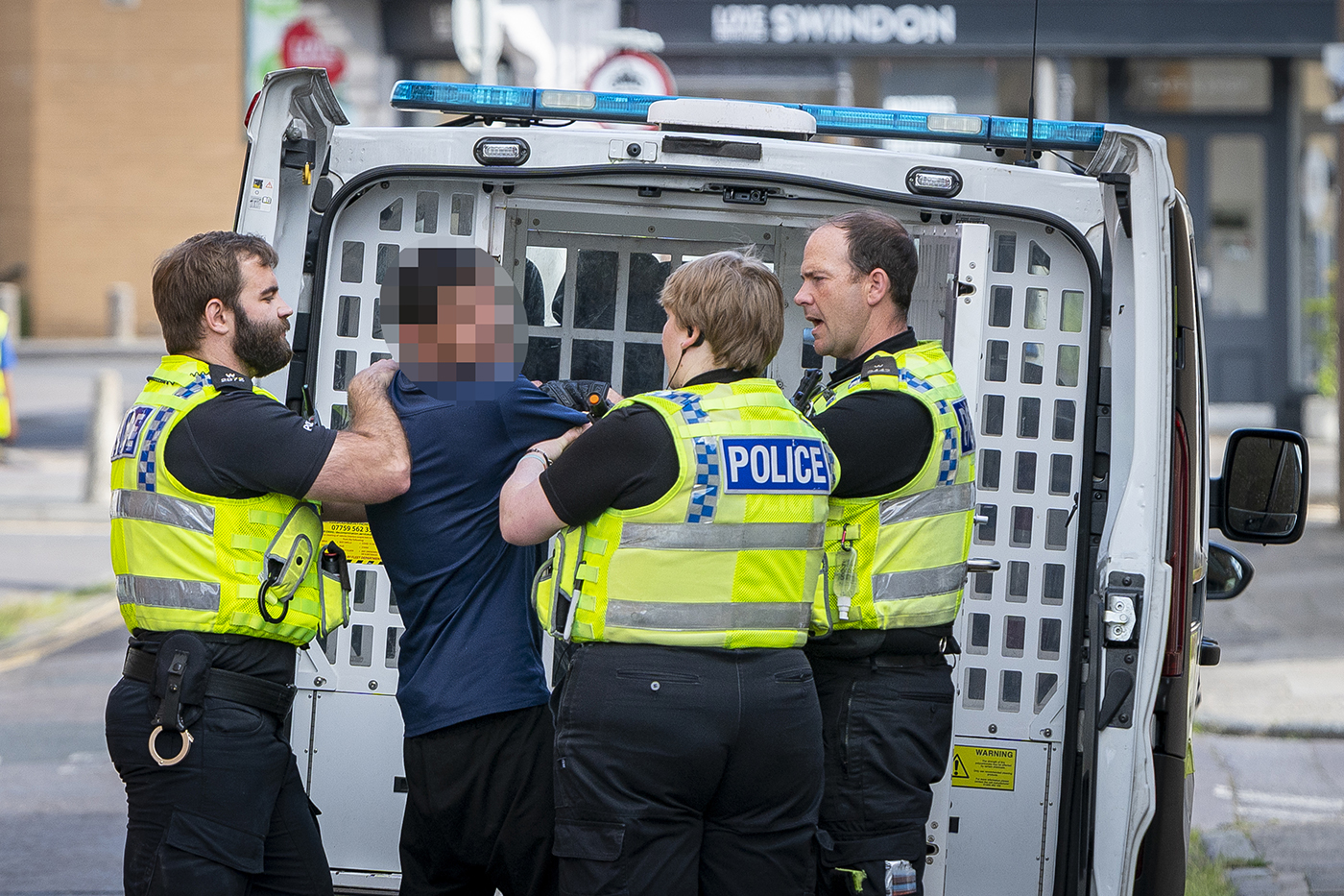 Man and woman arrested after police called to incident in Swindon town ...