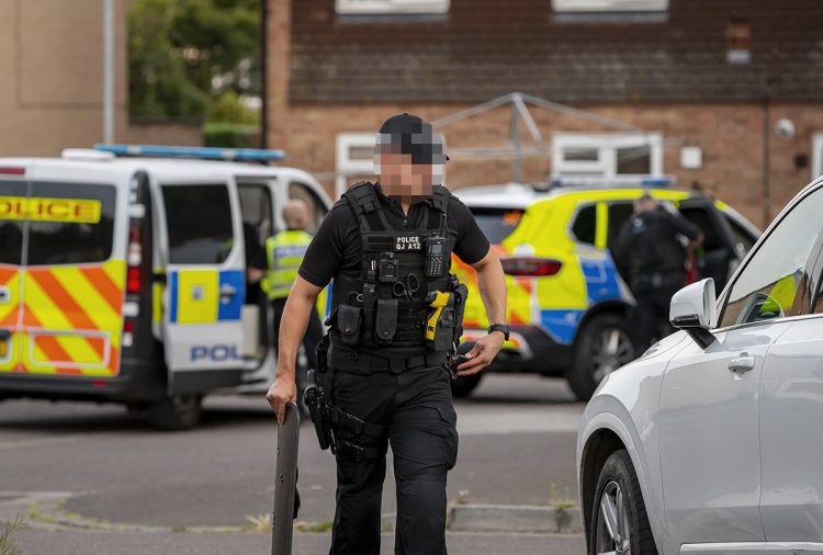 Man arrested at gunpoint by armed police after having 'sword' in ...
