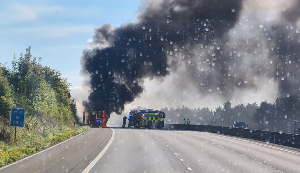 Traffic on M4 stopped in both directions as firefighters battle lorry fire
