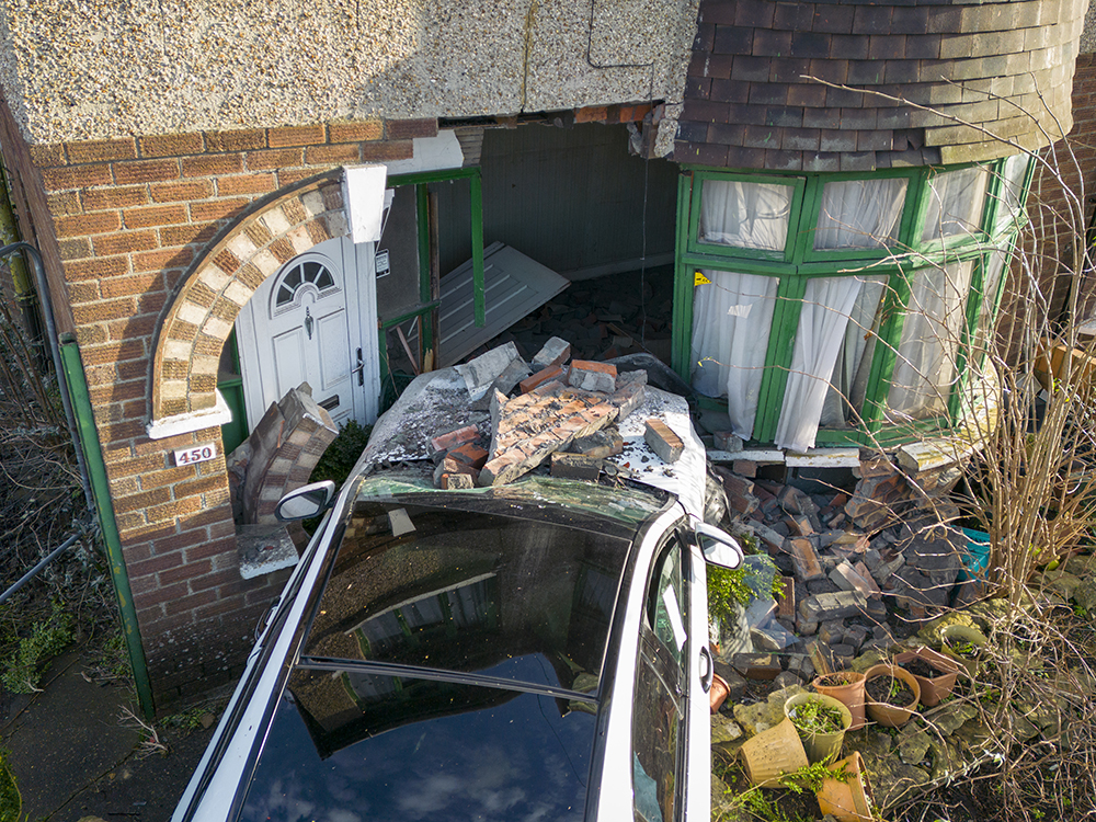 New photos reveal damage after driver ploughs car into Swindon home