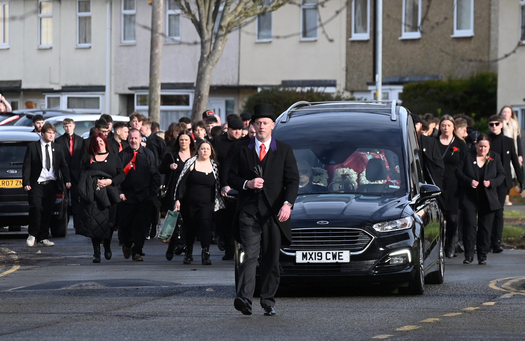 Hundreds of mourners line Swindon streets to say final goodbye to Owen Dunn