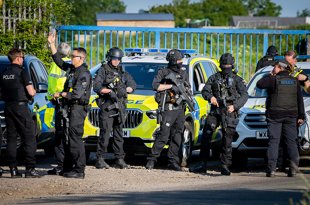Armed police raid Wiltshire traveller site as helicopter circles above
