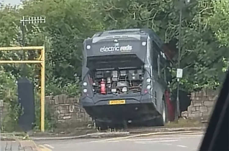 Bus crashes through wall in Salisbury - and gets stuck in ditch