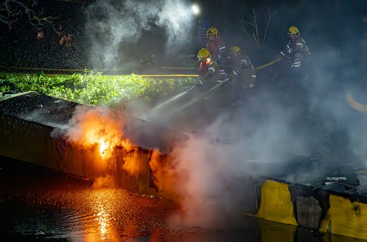 Pictures show firefighters tackling boat blaze on Devizes canal
