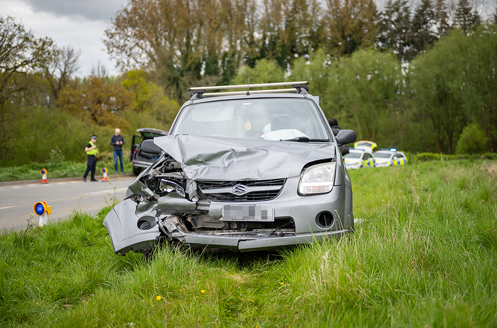 Two vehicles involved in junction crash on A3102 as road closed