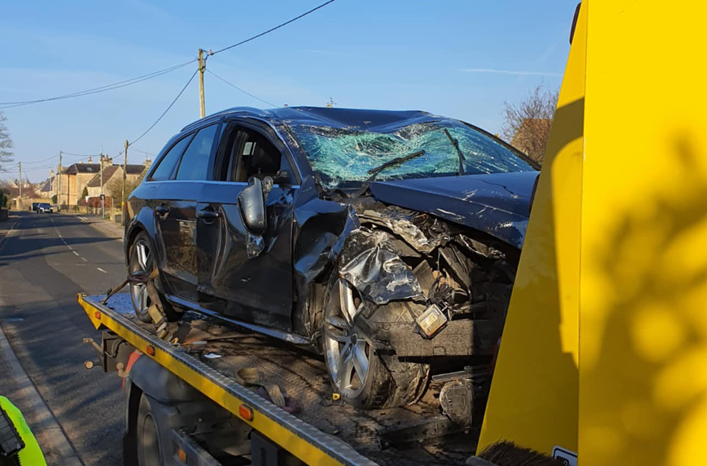 Car hits stone wall and overturns in smash outside Wiltshire pub