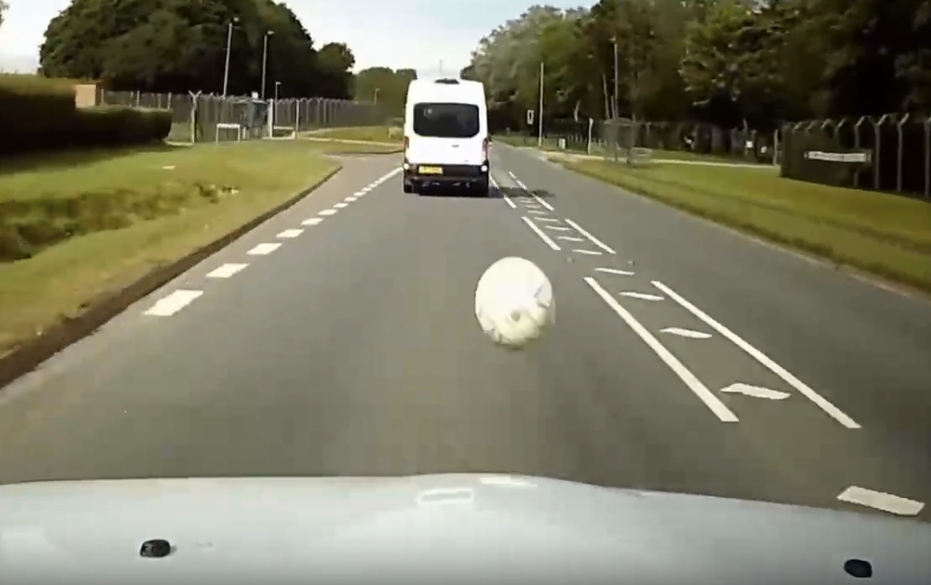 Driver's warning after football hits car and nearly causes crash