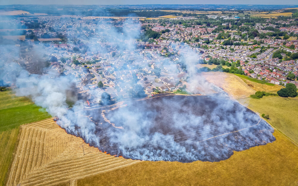 Scary scenes as raging field fire moves towards Warminster homes