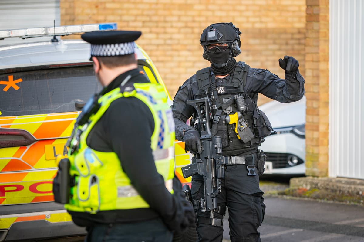 Four men arrested after armed police swarm street in Swindon